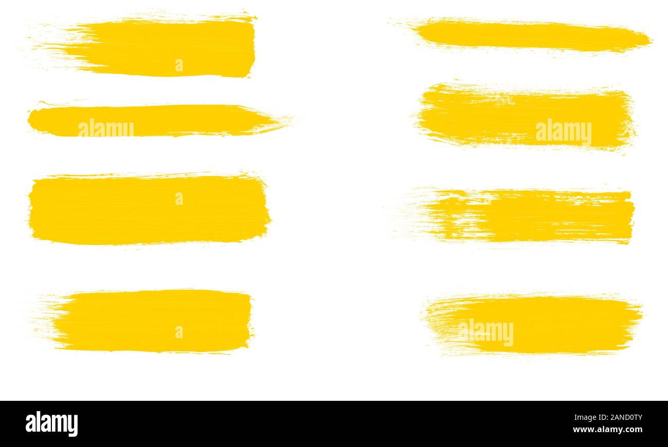 Yellow set brushes isolated on white background Stock Photo - Alamy