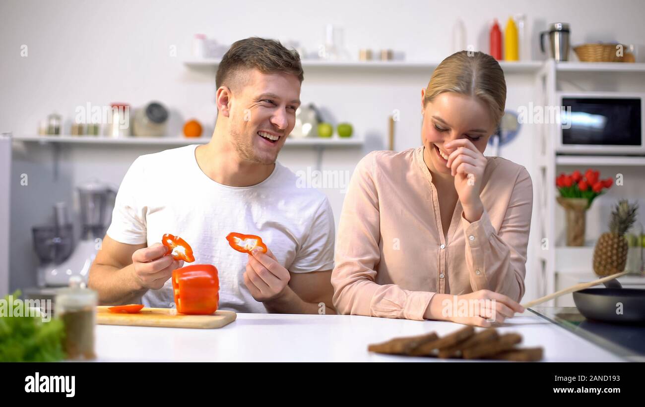 Romantic young couple fooling around hi-res stock photography and ...