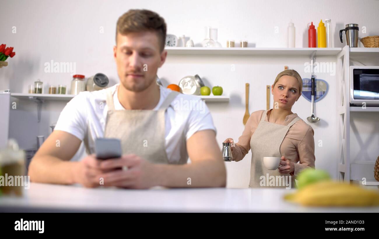 Handsome Man Typing Message In Phone Jealous Wife Peeping Cheating In