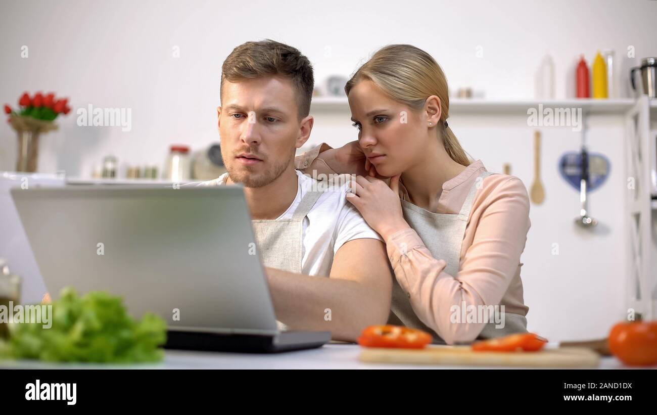 Couple home meal unhappy hi-res stock photography and images - Alamy