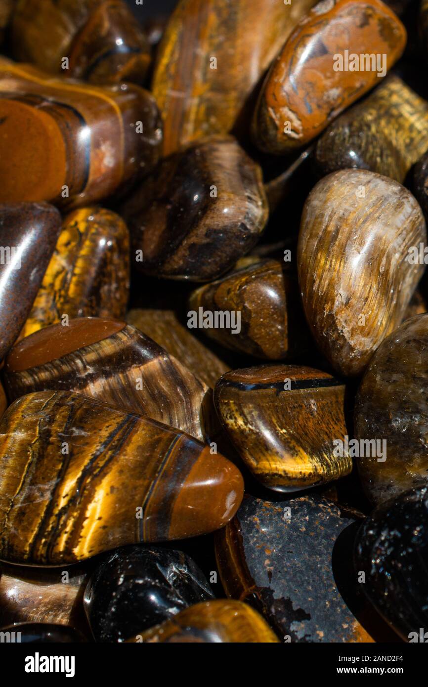 tiger's eye and hawk's eye gemstone as natural mineral rock specimen ...
