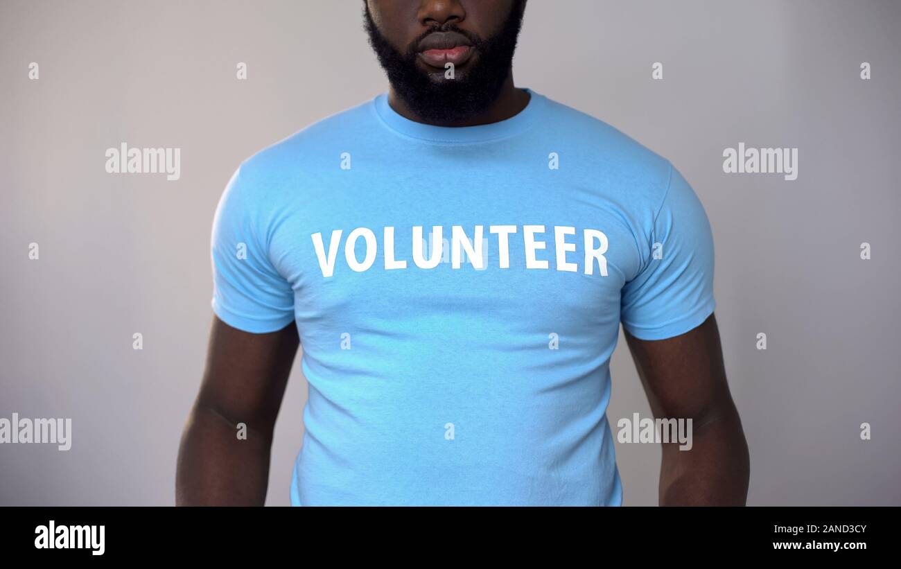 Volunteer blue t shirt hi-res stock photography and images - Alamy