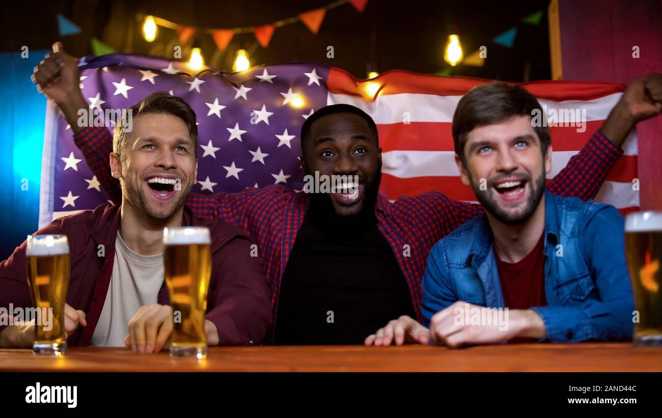 Sport fans waving american flag hi-res stock photography and images - Alamy