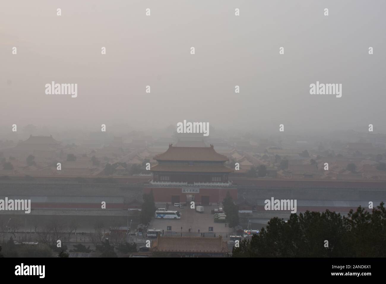 An aerial view of local landmarks seen faintly in the haze in Beijing ...