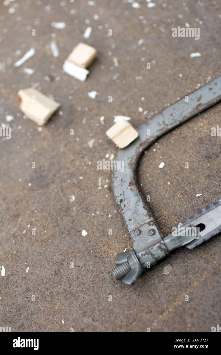 Hacksaw for metal on a carpentry table Stock Photo - Alamy