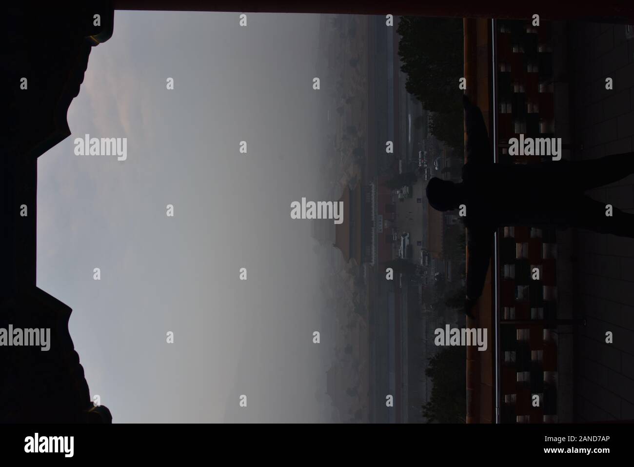 An aerial view of local landmarks seen faintly in the haze in Beijing ...