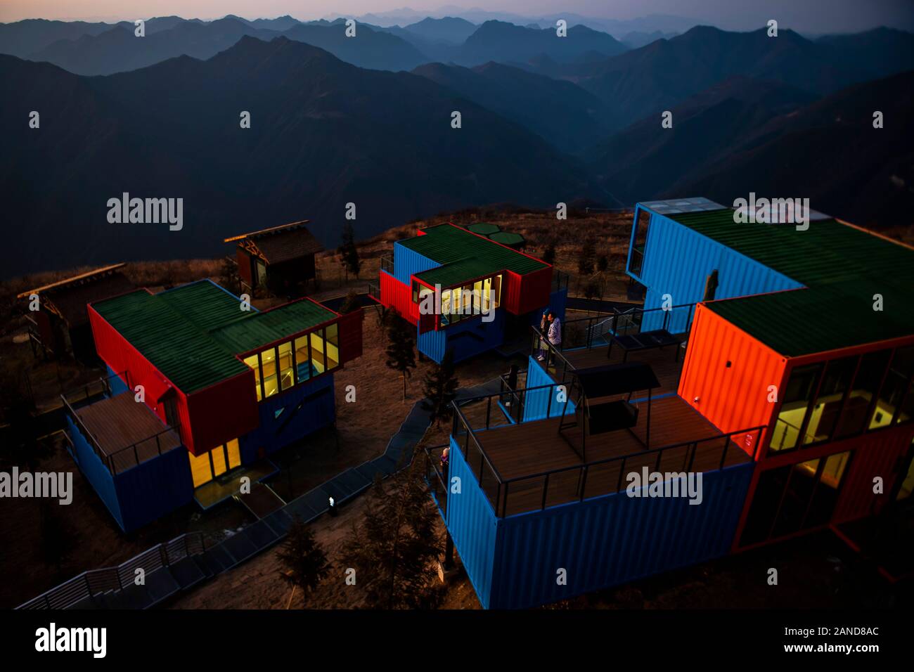 A colorful container hotel, a hotel composed of various container and ...