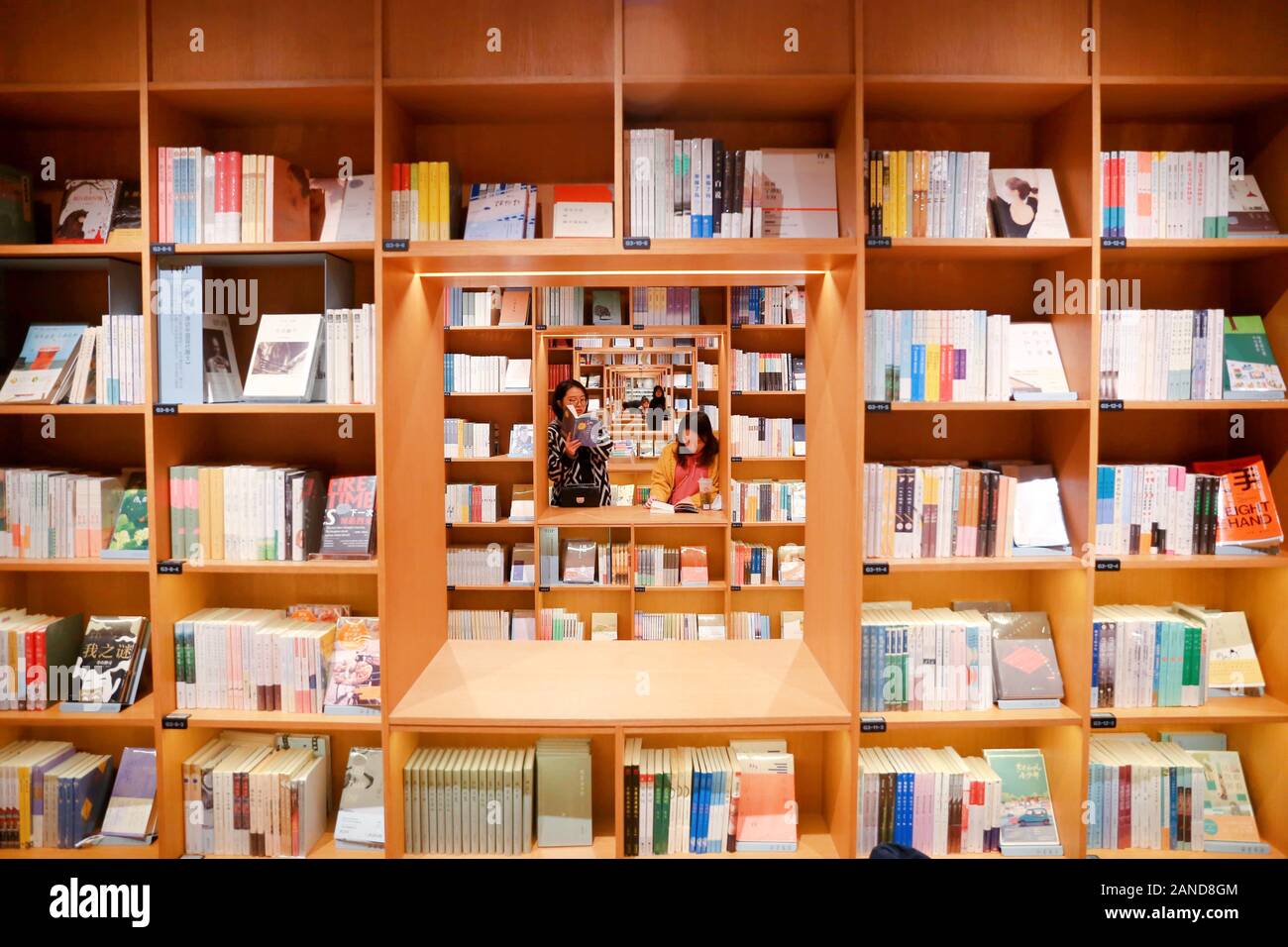 An inside view of citizens reading and strolling in the praised most ...