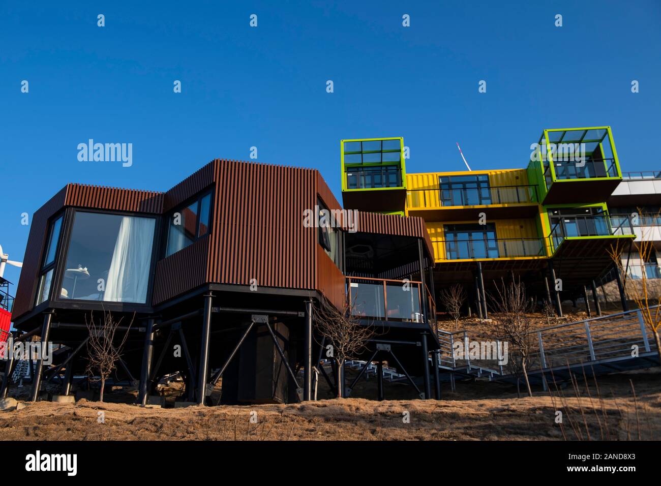 A colorful container hotel, a hotel composed of various container and ...