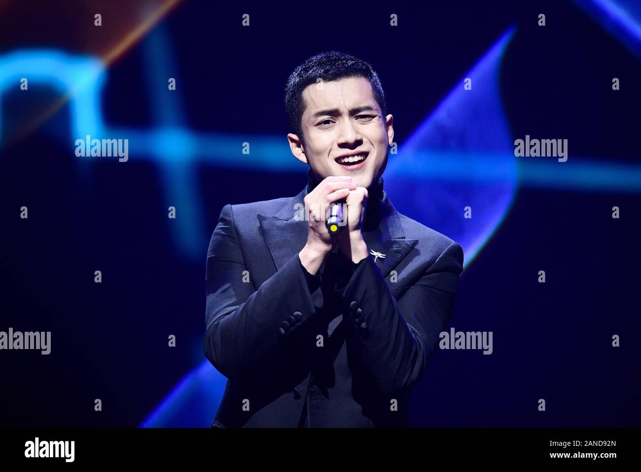 --FILE--Chinese actor Han Dongjun, also known as Elvis Han, sings at ...
