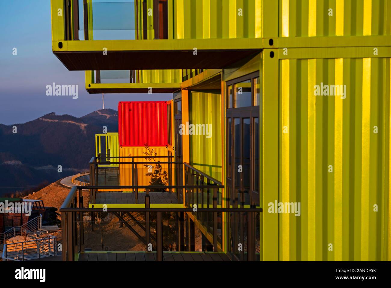 A colorful container hotel, a hotel composed of various container and ...