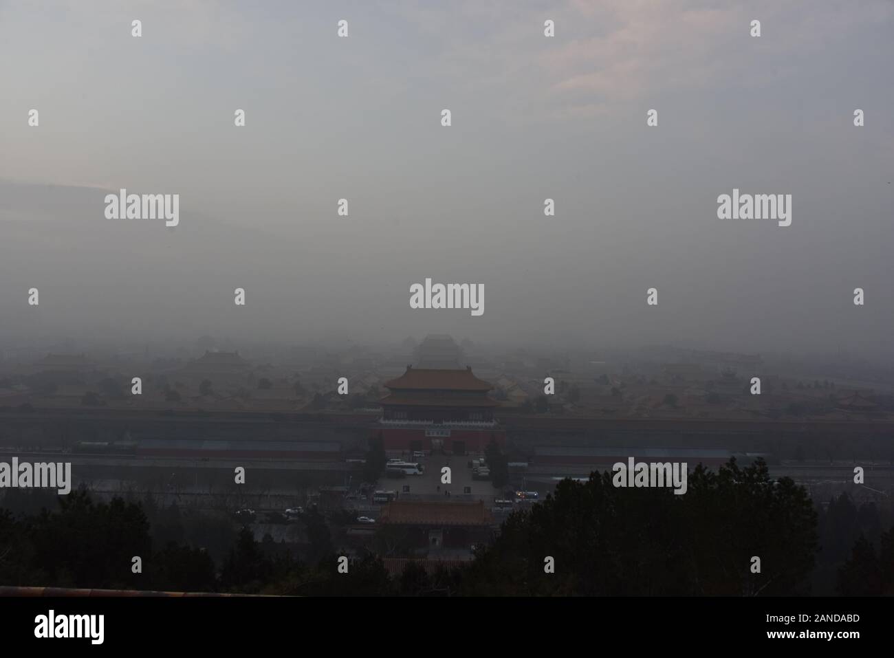 An aerial view of local landmarks seen faintly in the haze in Beijing ...