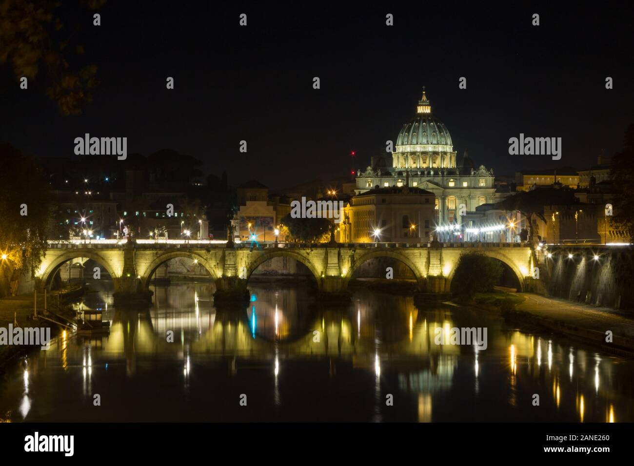 Night scene of Rome, Tevere river with Saint Peter basilica in ...