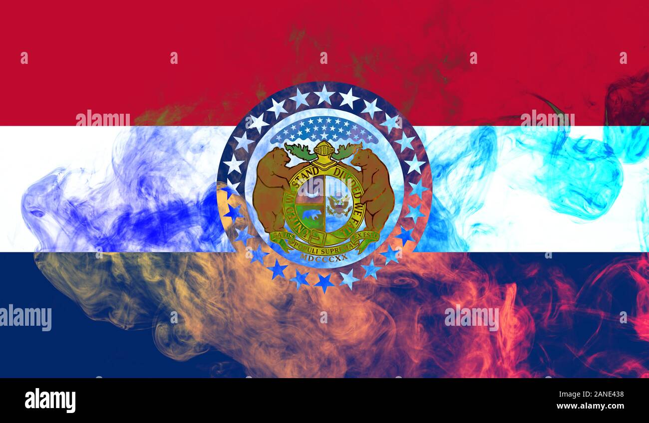 The national flag of the US state Missouri in against a gray smoke on ...