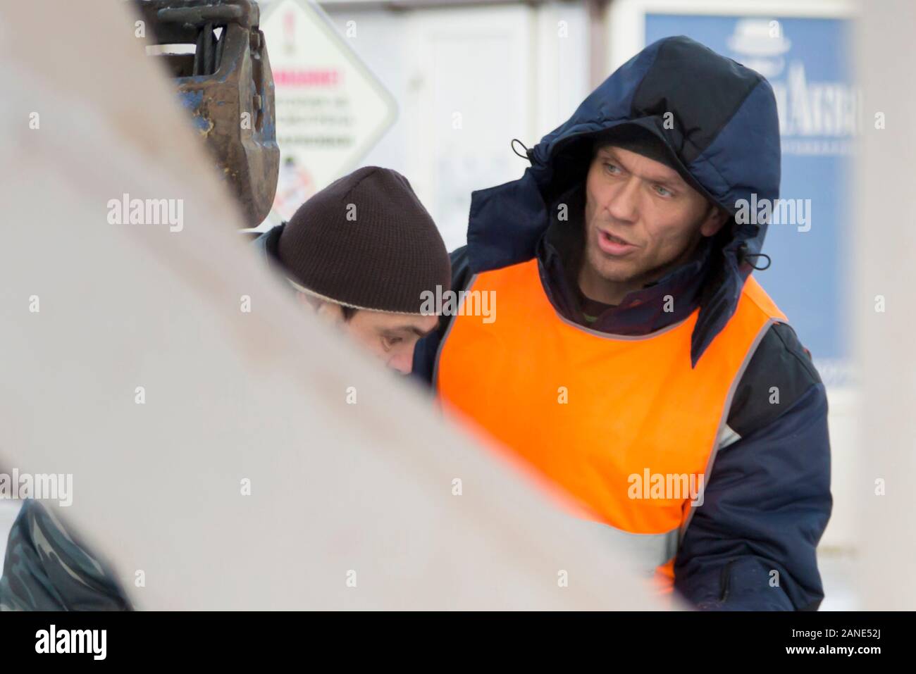 Two workers at the site of the ice camp Stock Photo - Alamy