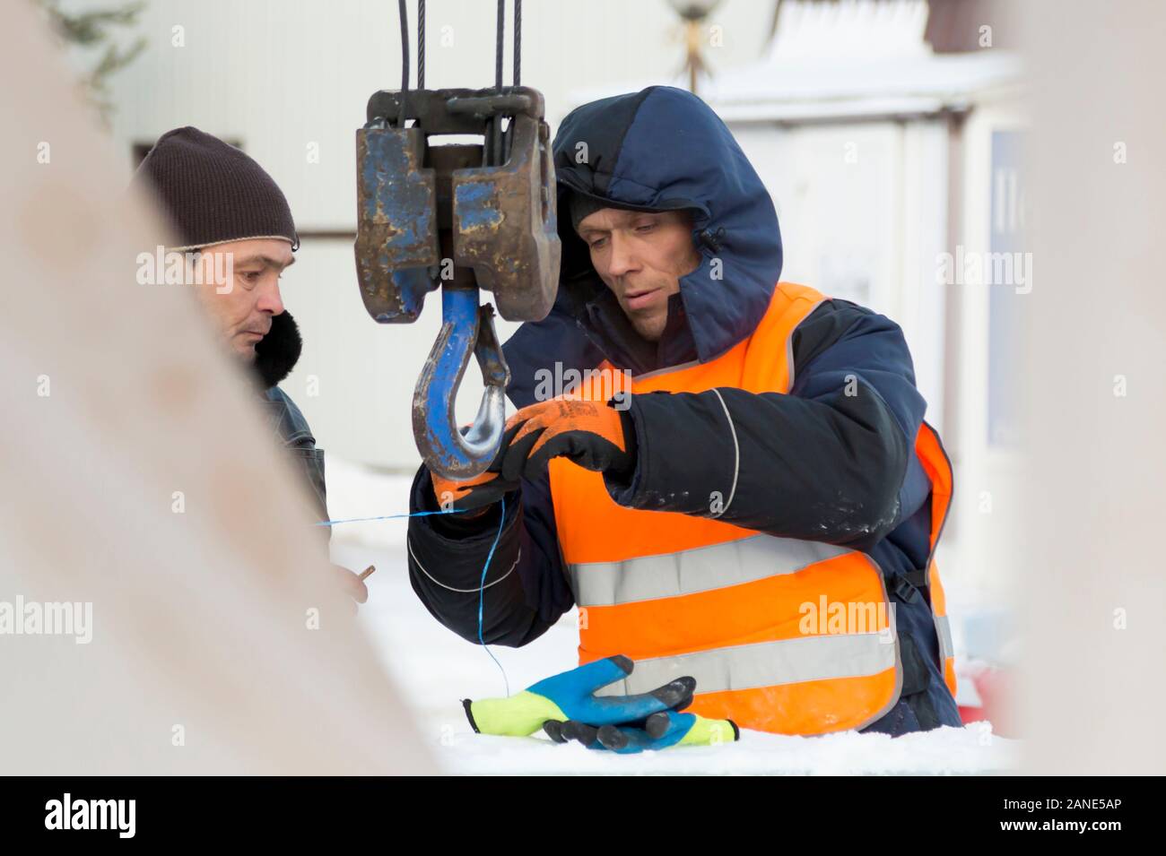 Two workers at the site of the ice camp Stock Photo - Alamy
