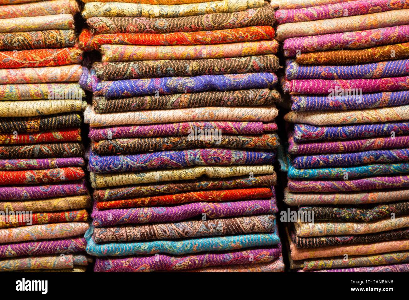 Pile of bright Multi-colored pieces of fabric in a bazaar Stock Photo ...