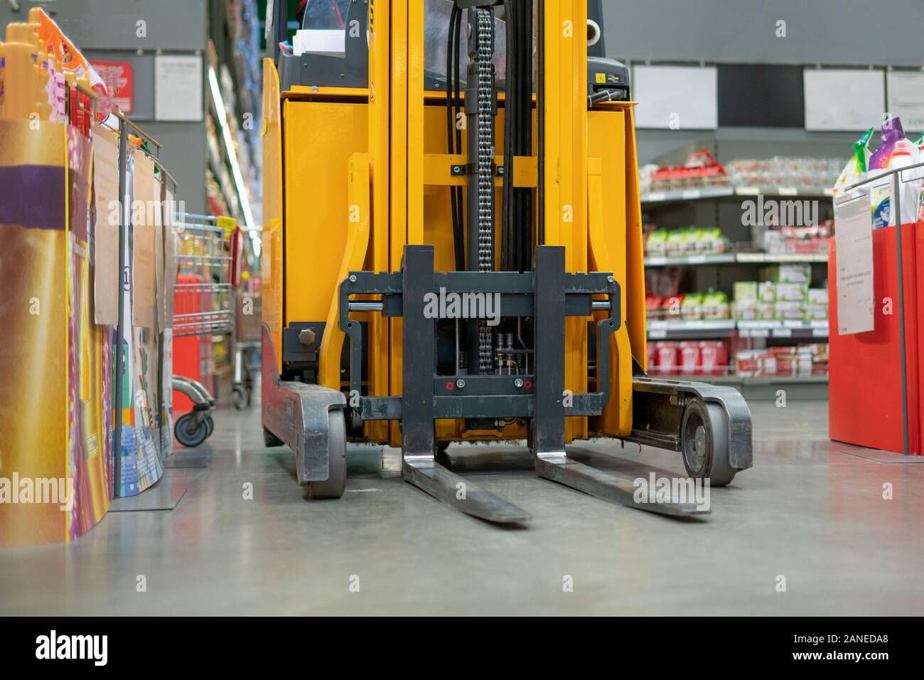 Forklift stacking products in warehouse hi-res stock photography and ...
