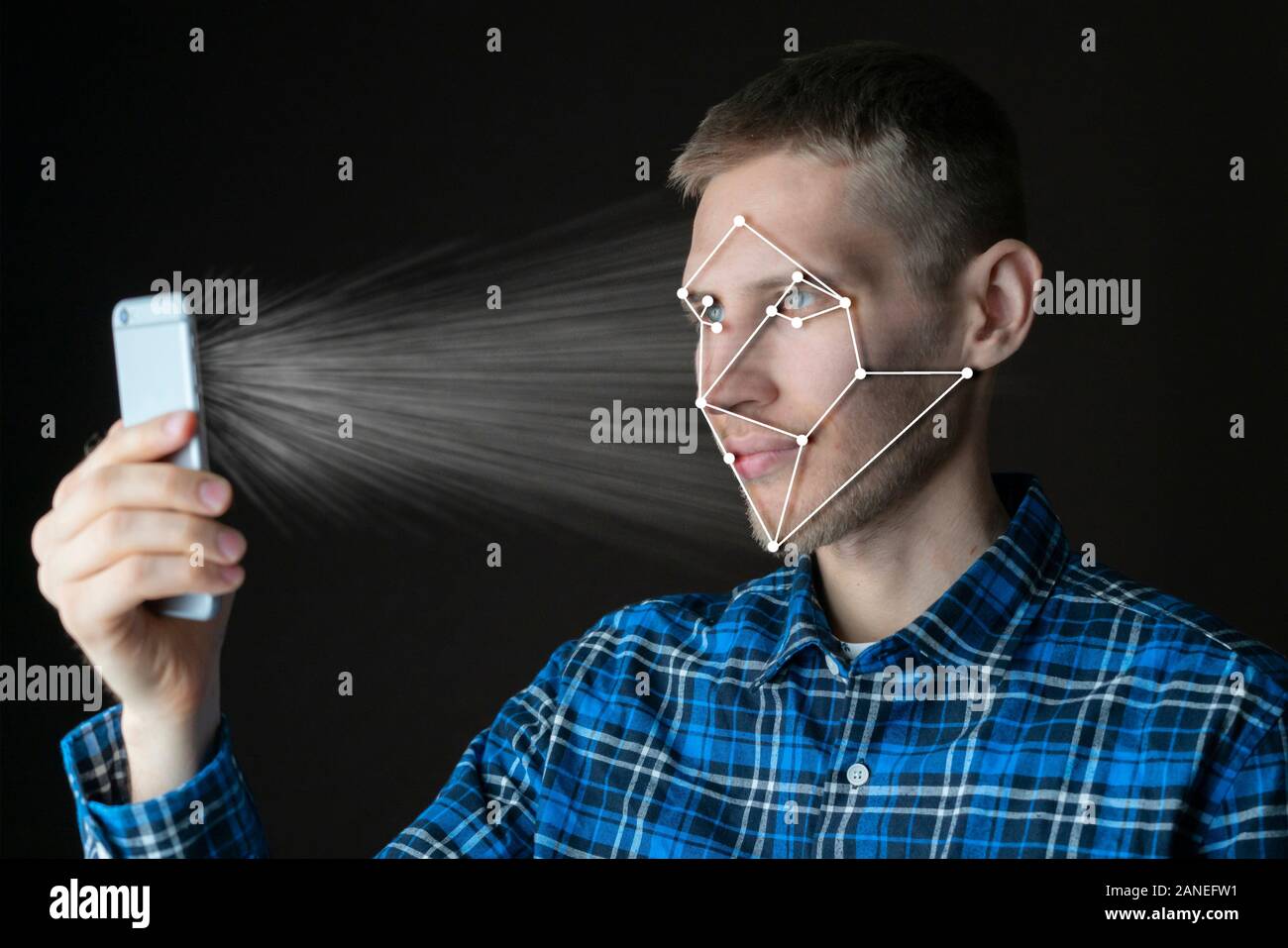 a man using his phone to face identification and authorization ...