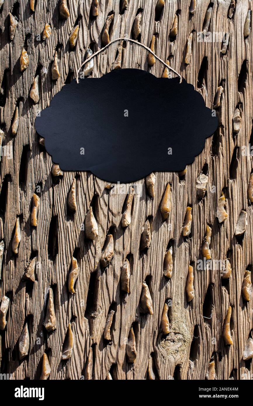 Black Empty Sign Board with string for hanging on wall Stock Photo - Alamy
