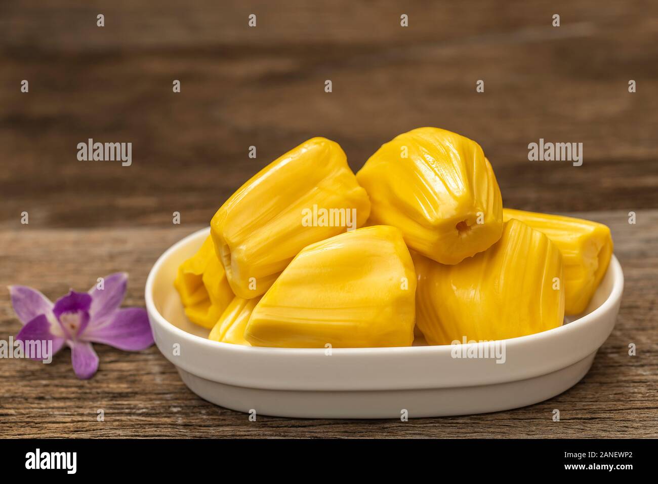 Jackfruit on the wooden table background Stock Photo - Alamy