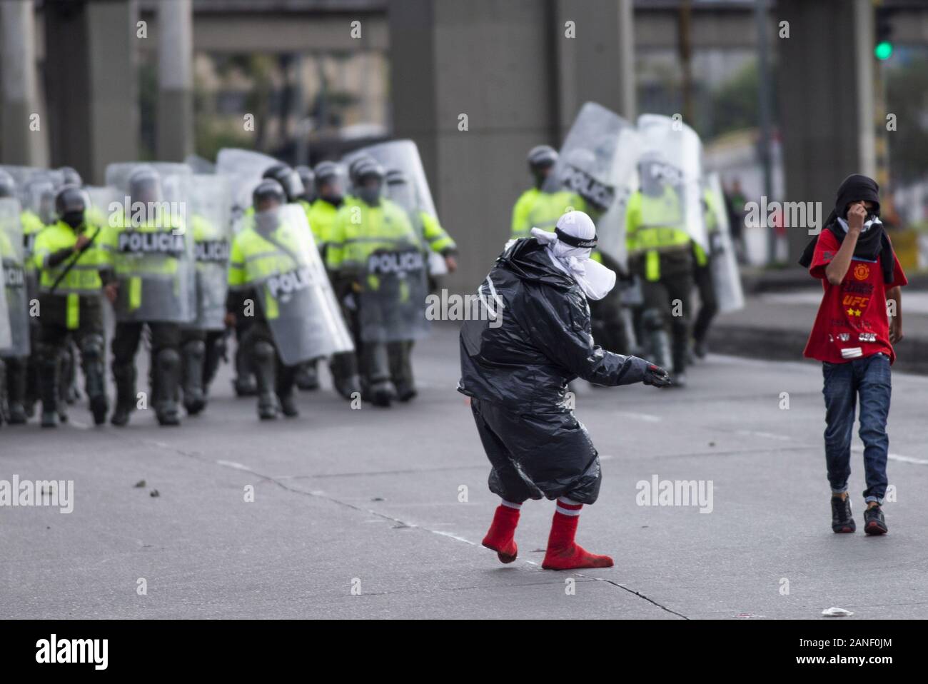 Hooded man in riots hi-res stock photography and images - Alamy