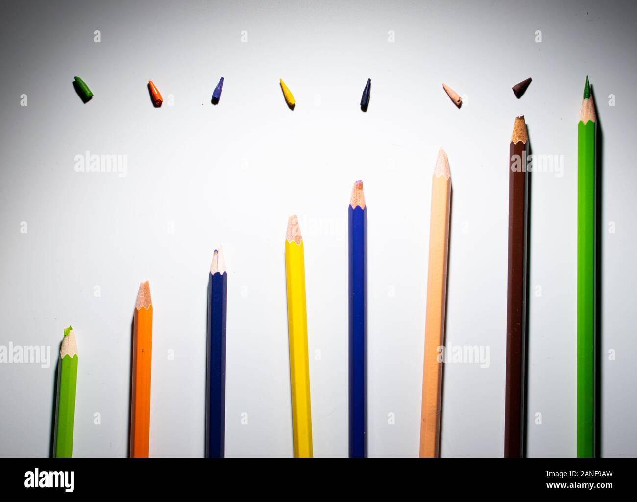 Different colors of pencils, in a pattern. Colored crayons arranged in ...