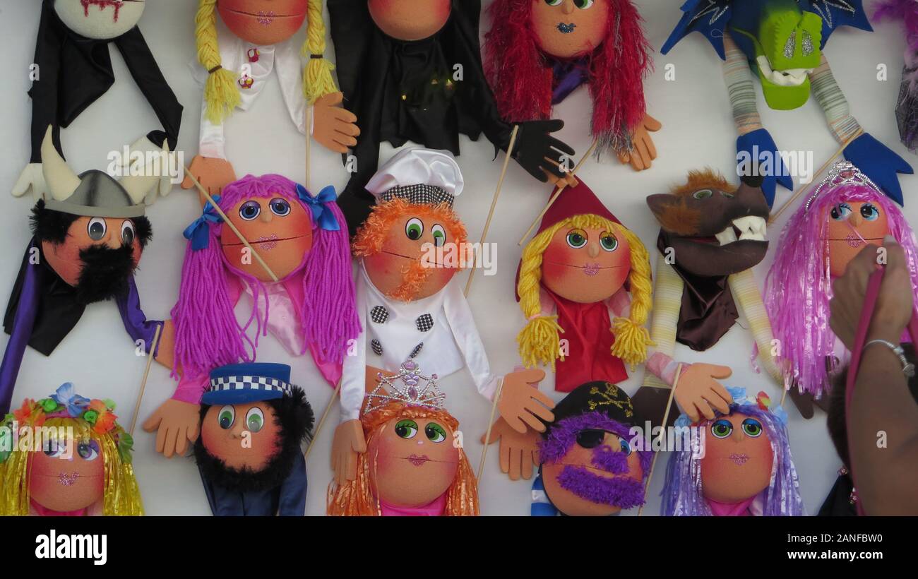 Colorful handmade puppets on display at local fair inAndalusan village ...