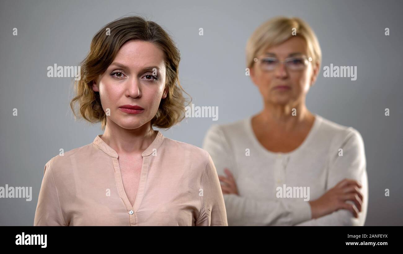 Strict looking woman hi-res stock photography and images - Alamy