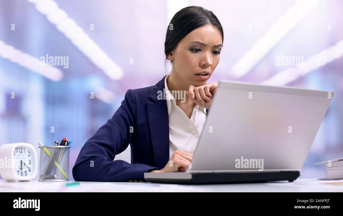 Upset company worker looking laptop, disappointed with project result ...