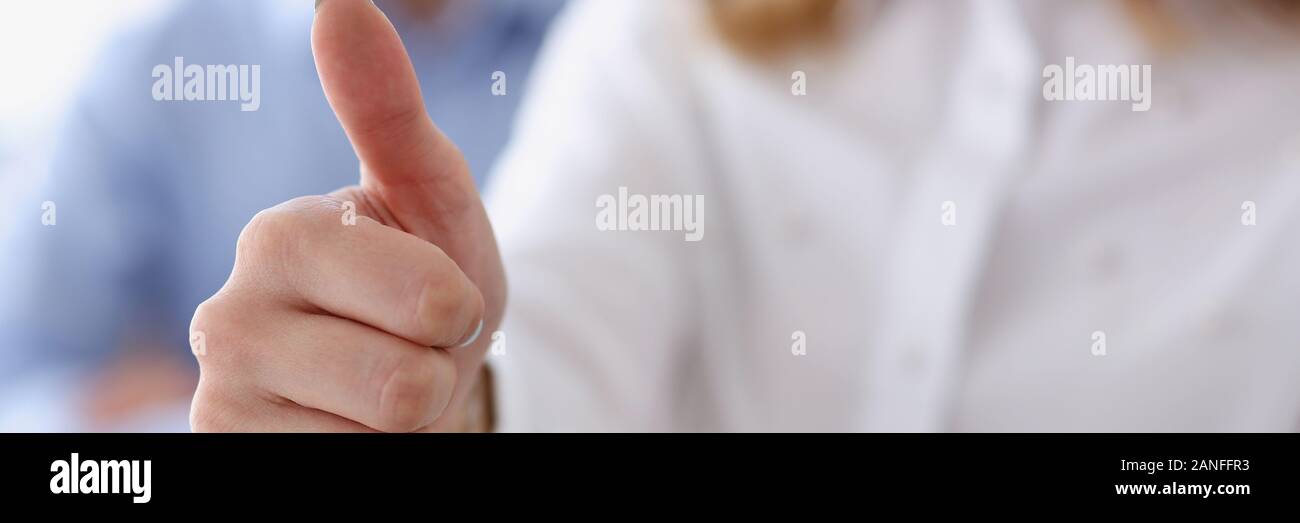 Female hand showing ok or approval sign with thumb Stock Photo - Alamy