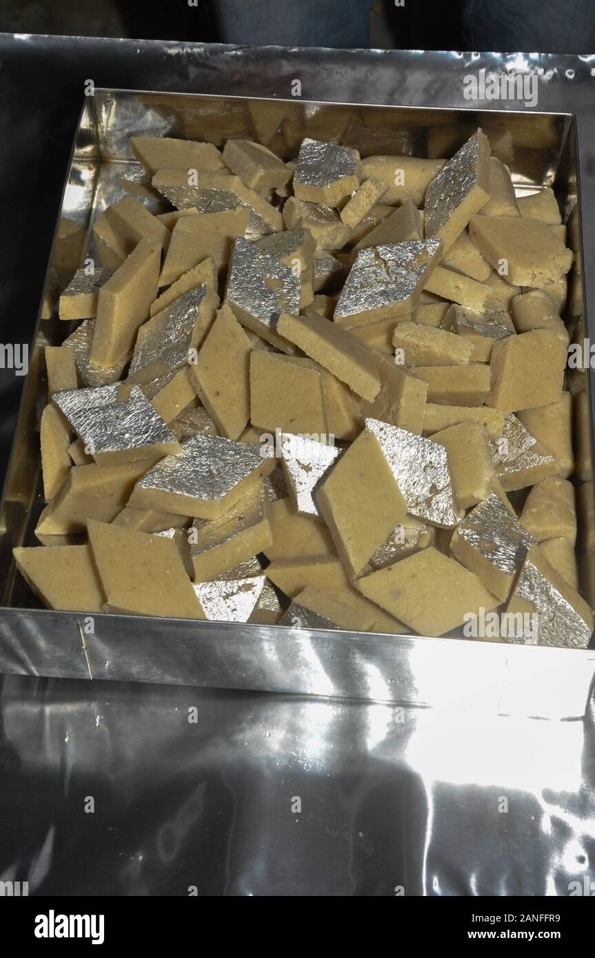 Barfi in sweet dish at indian wedding Stock Photo - Alamy