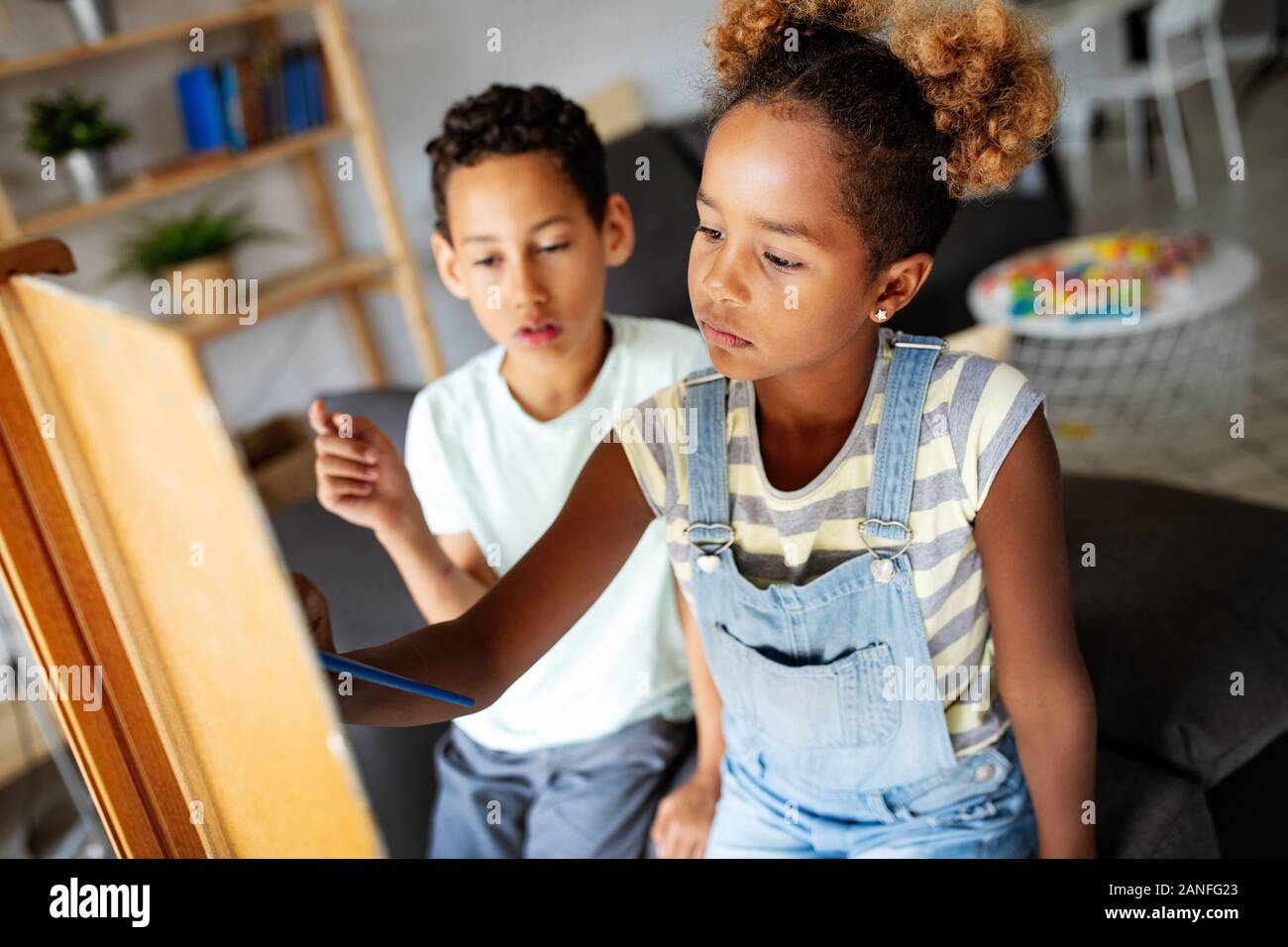 Concept of early childhood education, painting, talent, happy kids ...