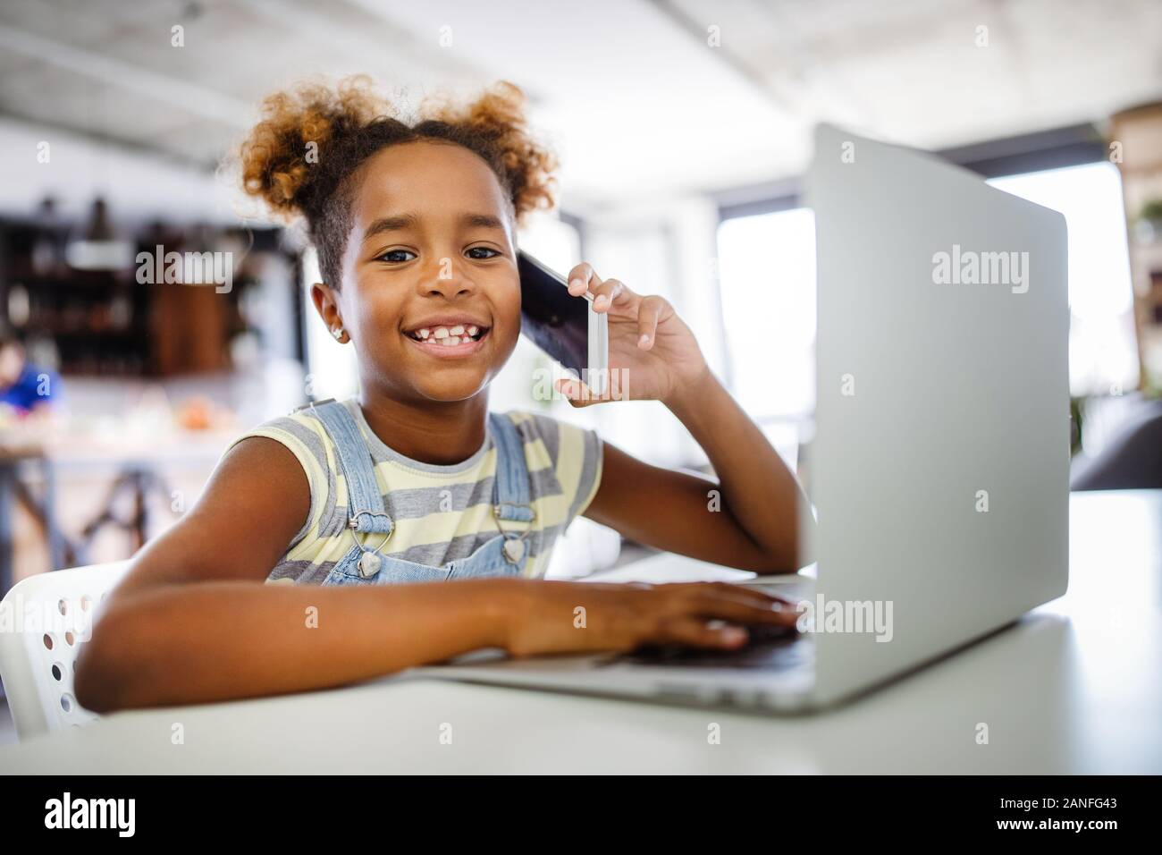 Game, study, fun concept. Happy children spending time with notebook ...