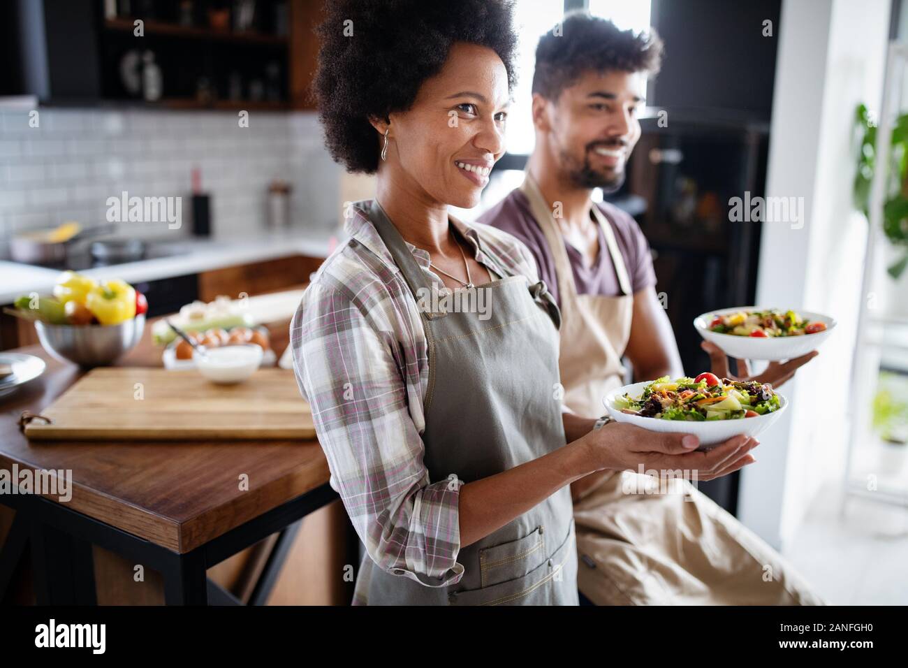 Portrait of happy chefs in kitchen. Healthy food, cooking, people ...