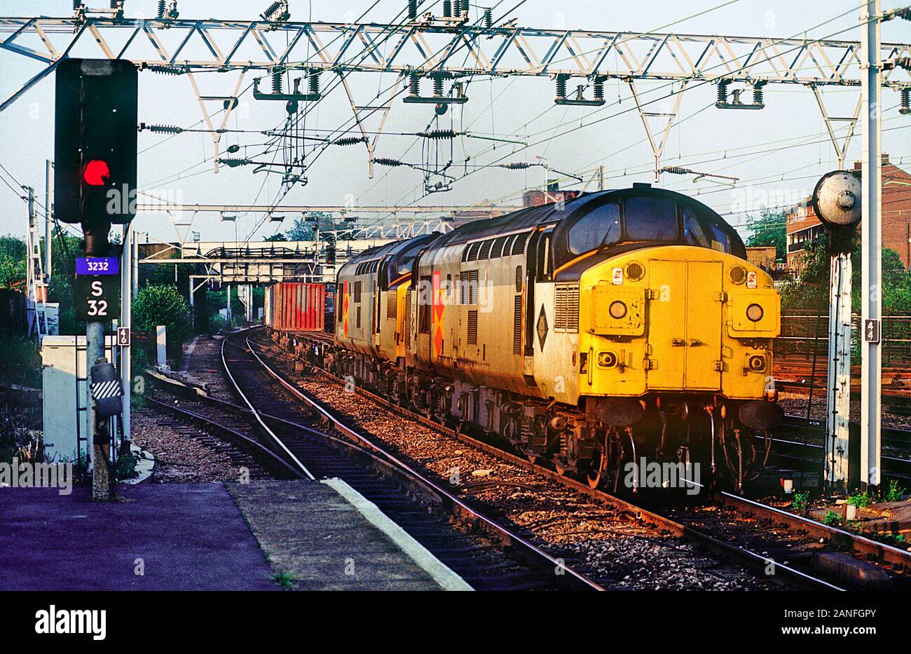 A pair of class 37 diesel locomotives numbers 37055 and 37218 double ...