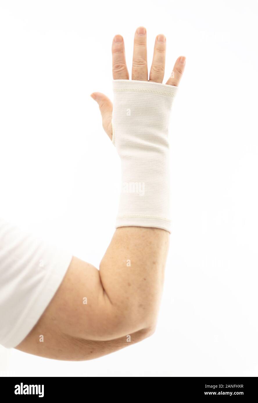 Person with a wrist support on his hand over white background Stock ...
