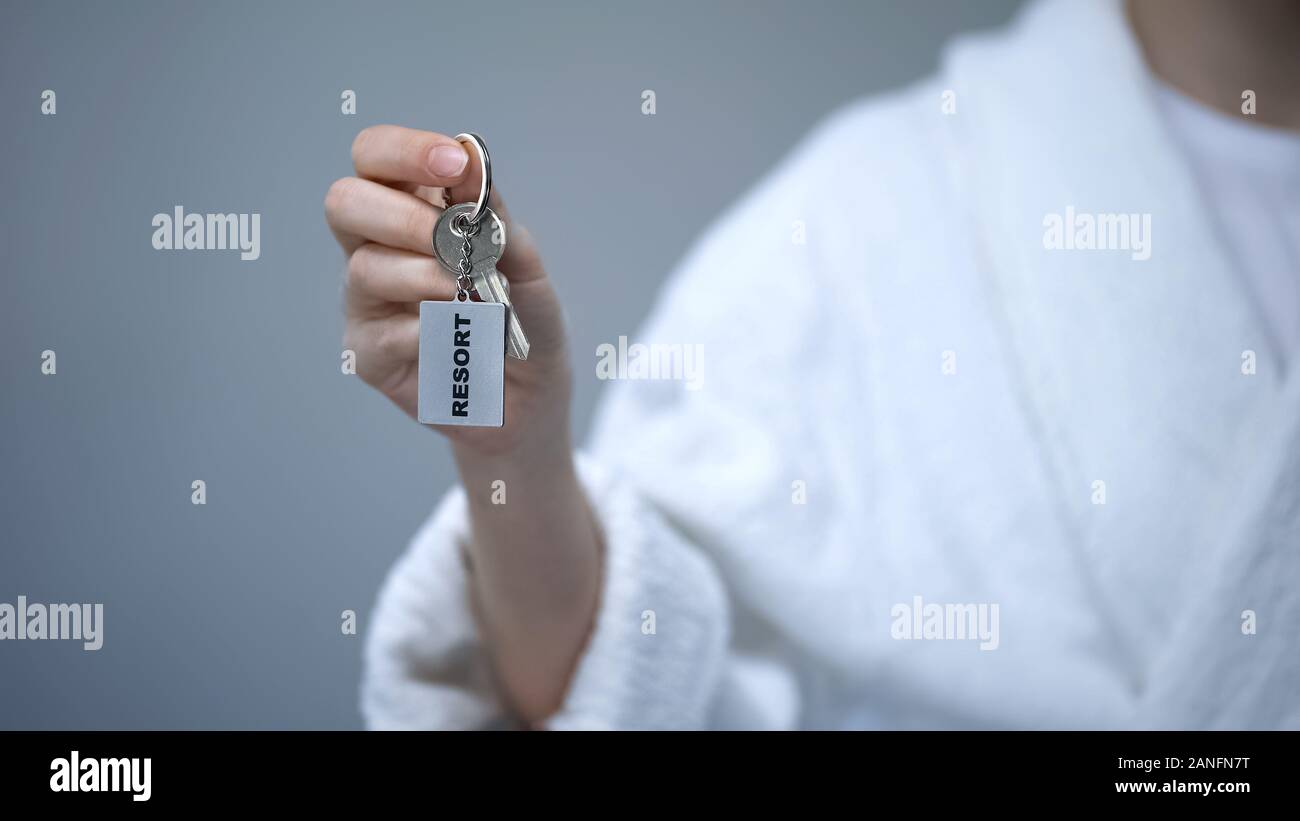 Woman in bathrobe holding keys hi-res stock photography and images - Alamy