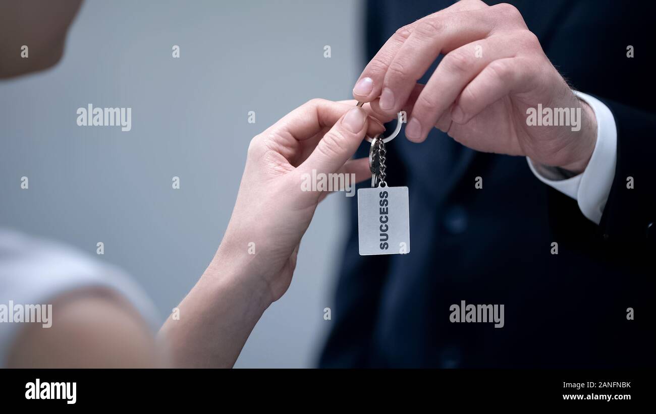 Man giving woman keys to Success, secret tips to turn dream into ...