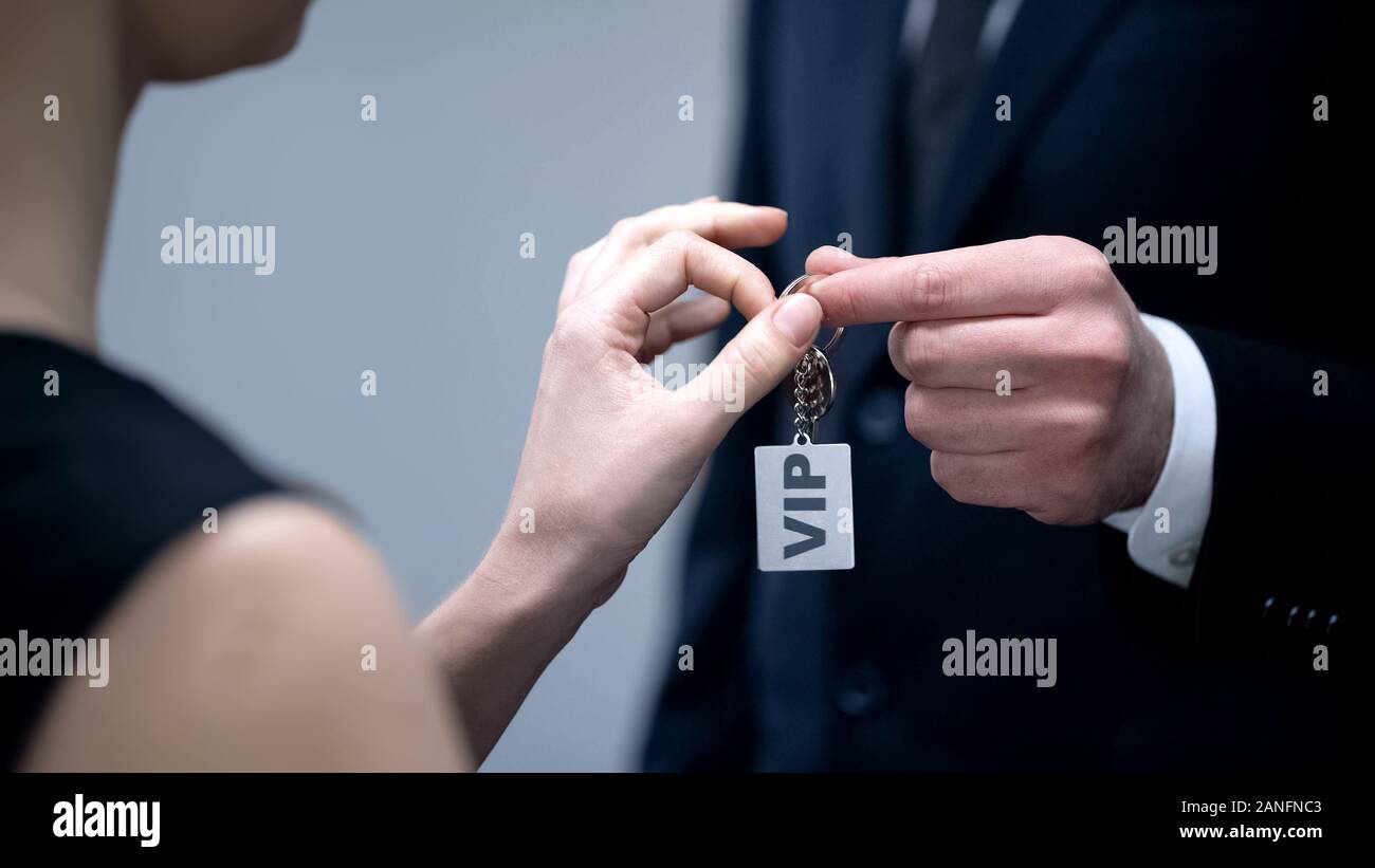 Hotel room keys woman hi-res stock photography and images - Alamy