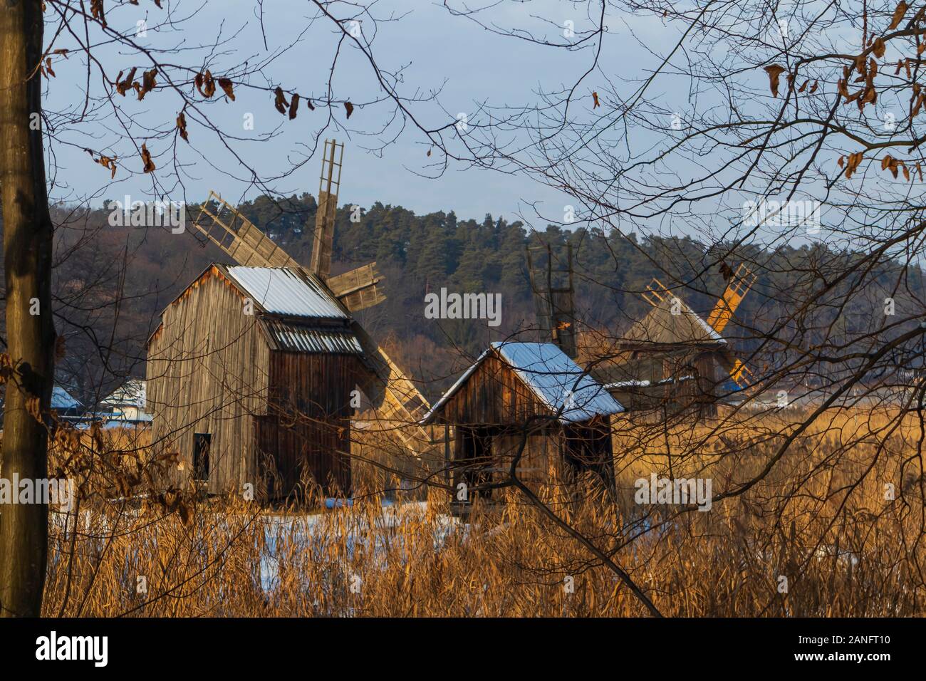 Traditional wooden windmill from Romania in winter landscape Stock ...