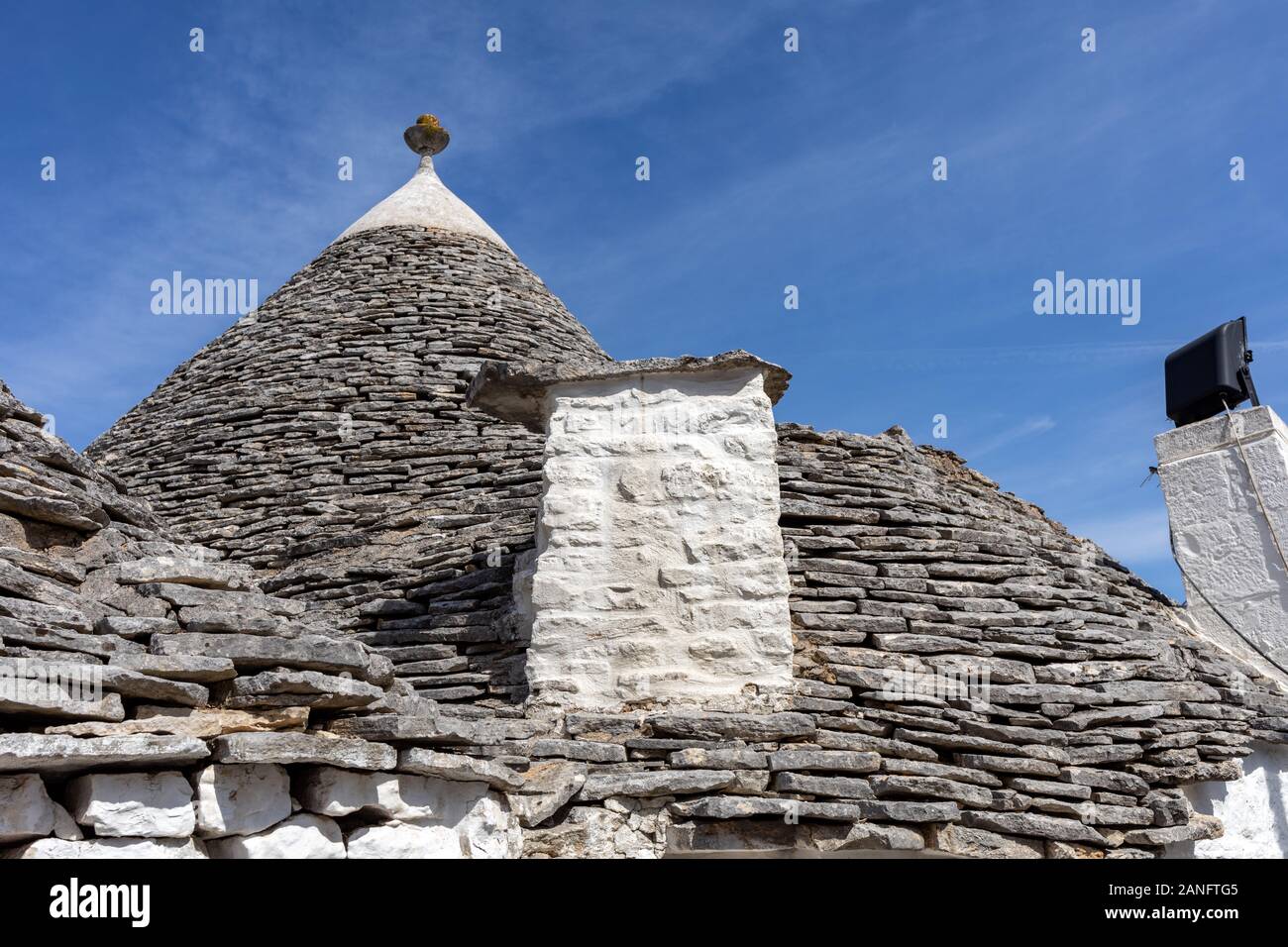 Stone roof of Trulli House in Alberobello, Italy. The style of ...