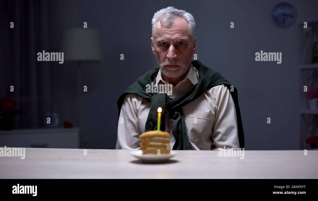 Lonely old man celebrating birthday alone, forgotten by children and ...