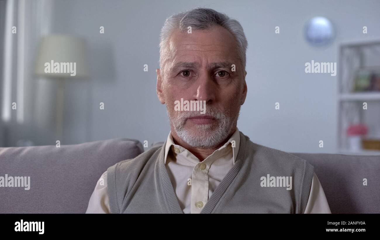 Portrait of sad elderly man feeling lonely and helpless, retirement ...