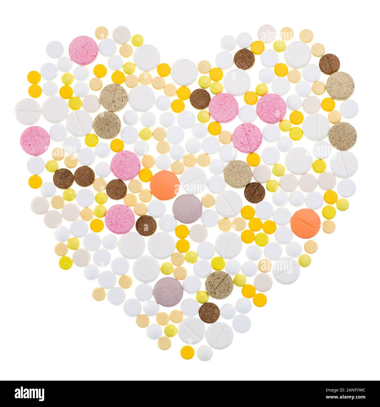 Various tablets in the shape of a heart on white background Stock Photo ...