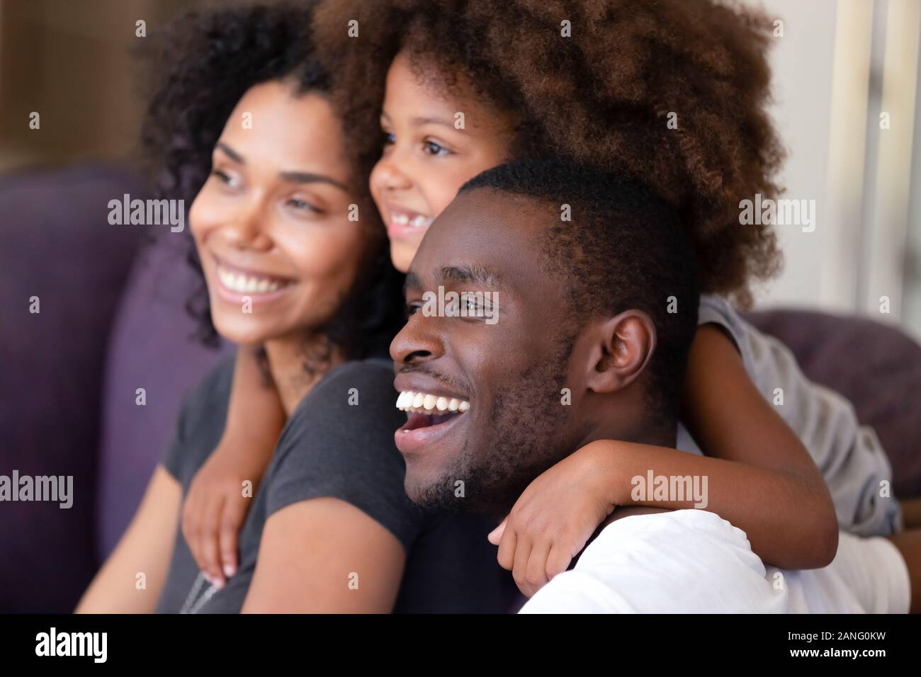 Excited African American family dream of bright future together Stock ...