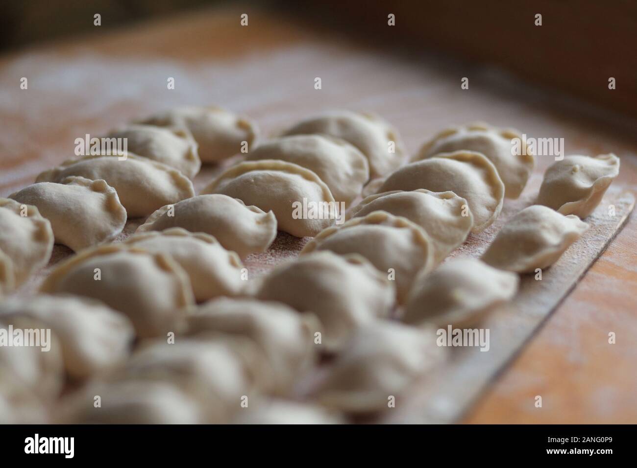 Vareniki, dumplings with potatoes on white background - traditional ...