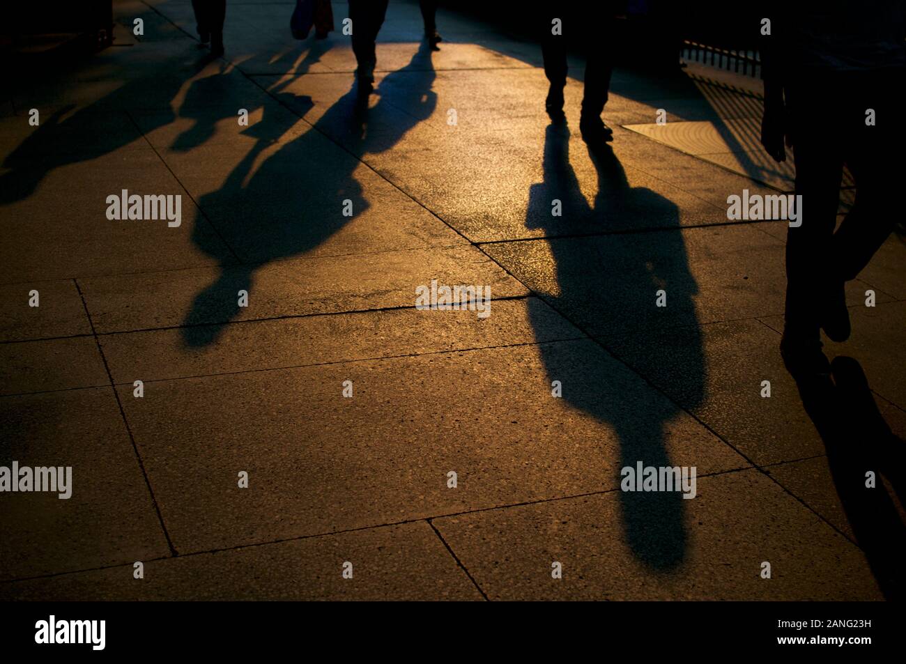 Shadows people walking on pavement hi-res stock photography and images ...