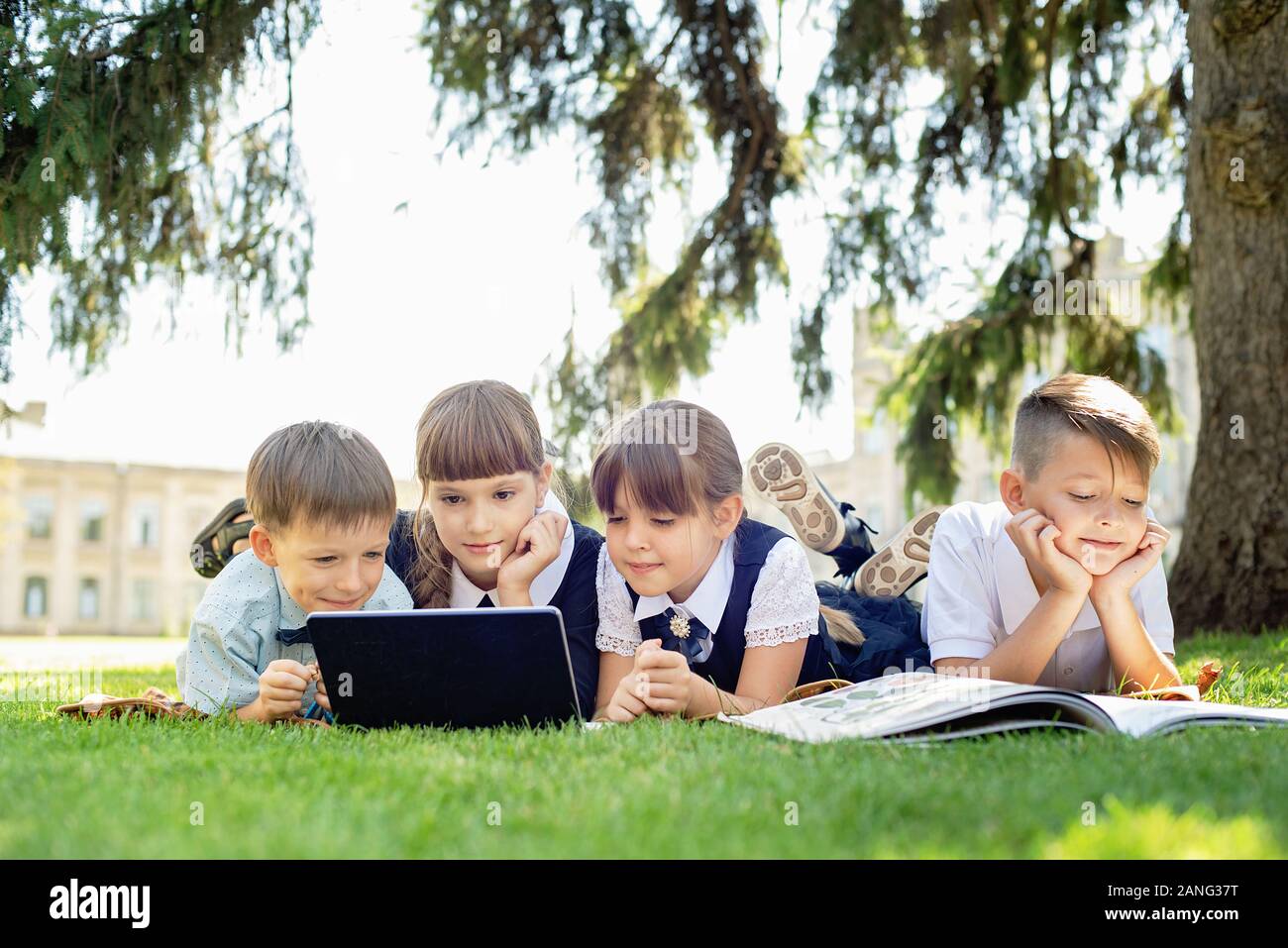 children with laptop computer. Little child using pc. Life online ...
