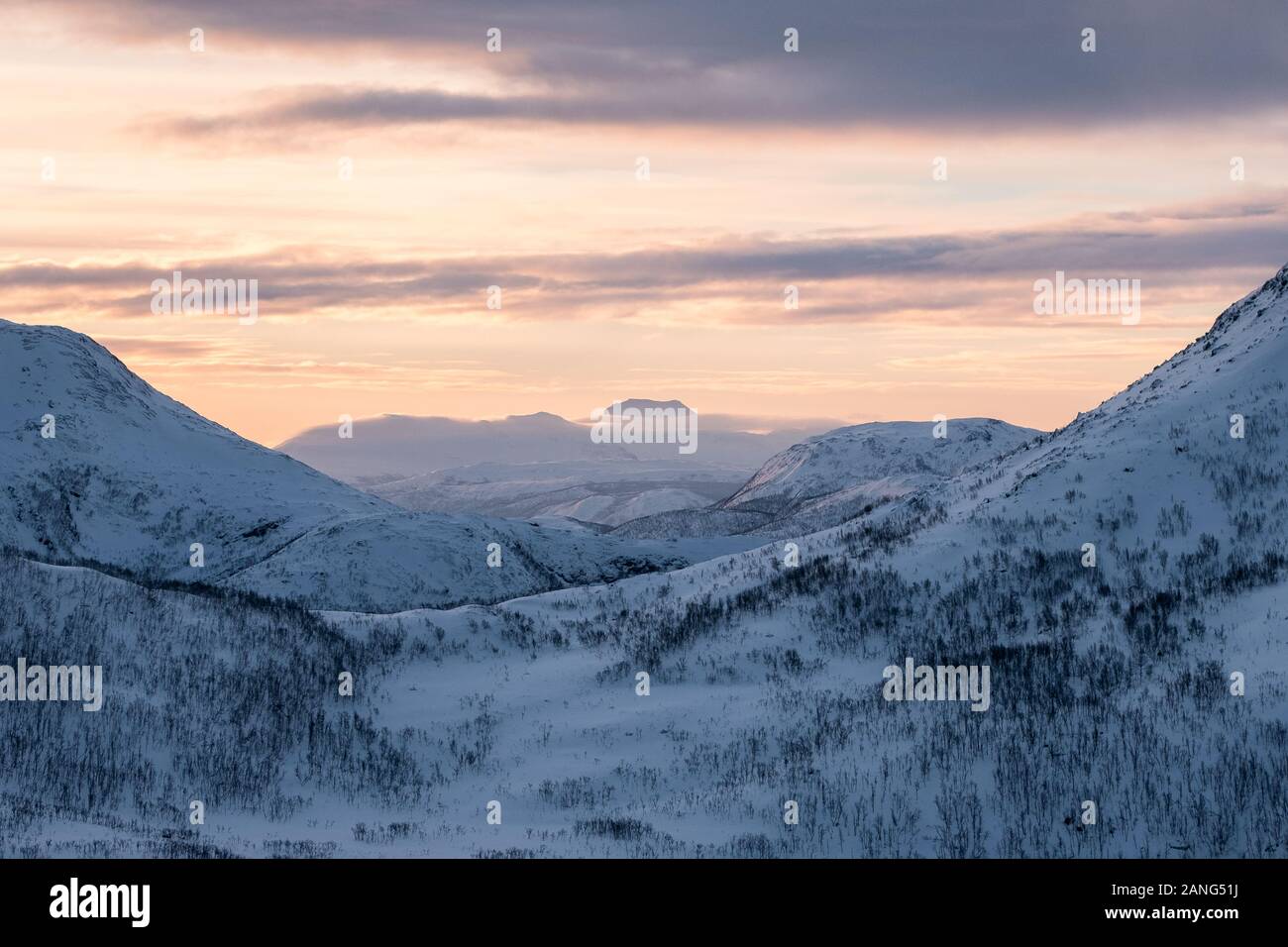 Scenery snowy mountain range with colorful sky on peak at sunrise Stock ...
